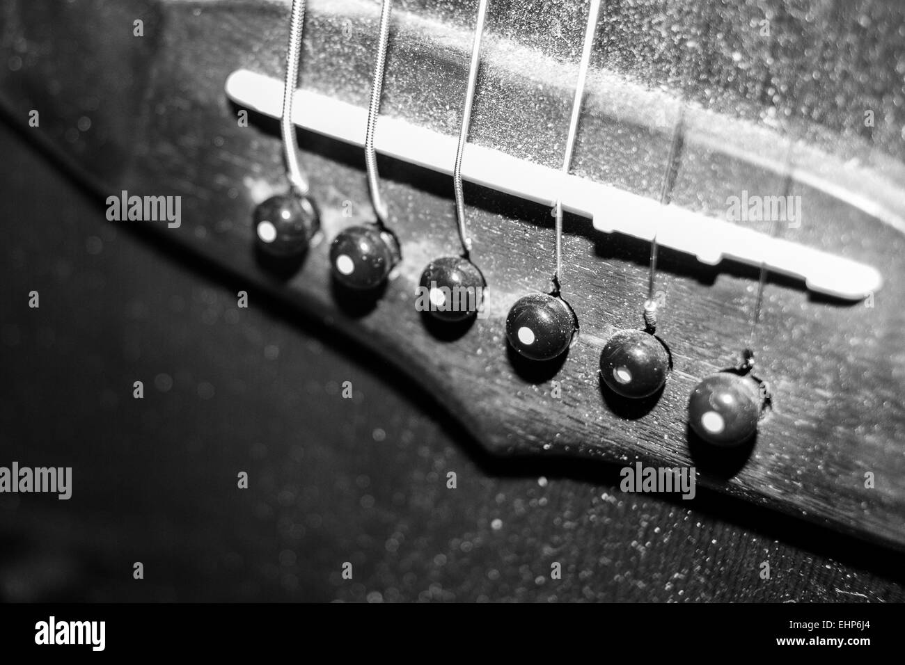 The bridge of a guitar gathering dust and showing it's age Stock Photo ...