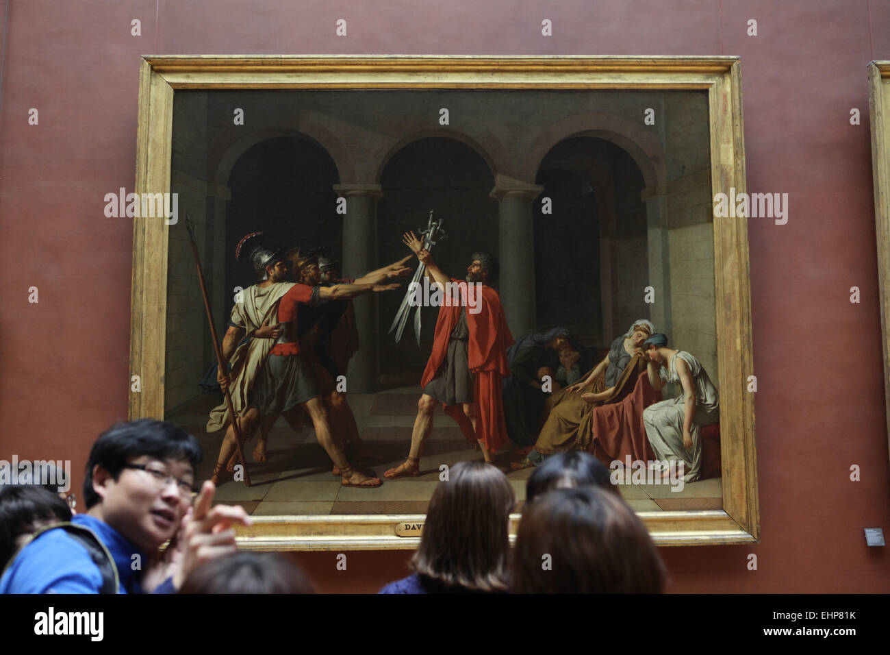 Visitors in front of painting 'Oath of the Horatii' (1784) by French ...