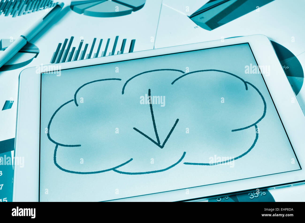 a drawing of a cloud with an arrow inside on the screen of a tablet ...