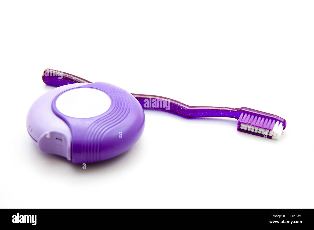 Asthmadisk with toothbrush Stock Photo - Alamy