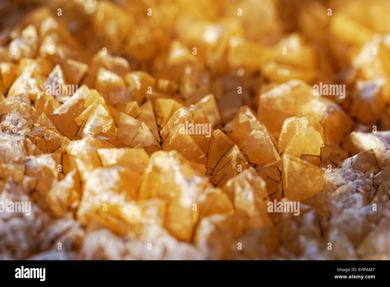 yellow crystals on the coast Stock Photo - Alamy