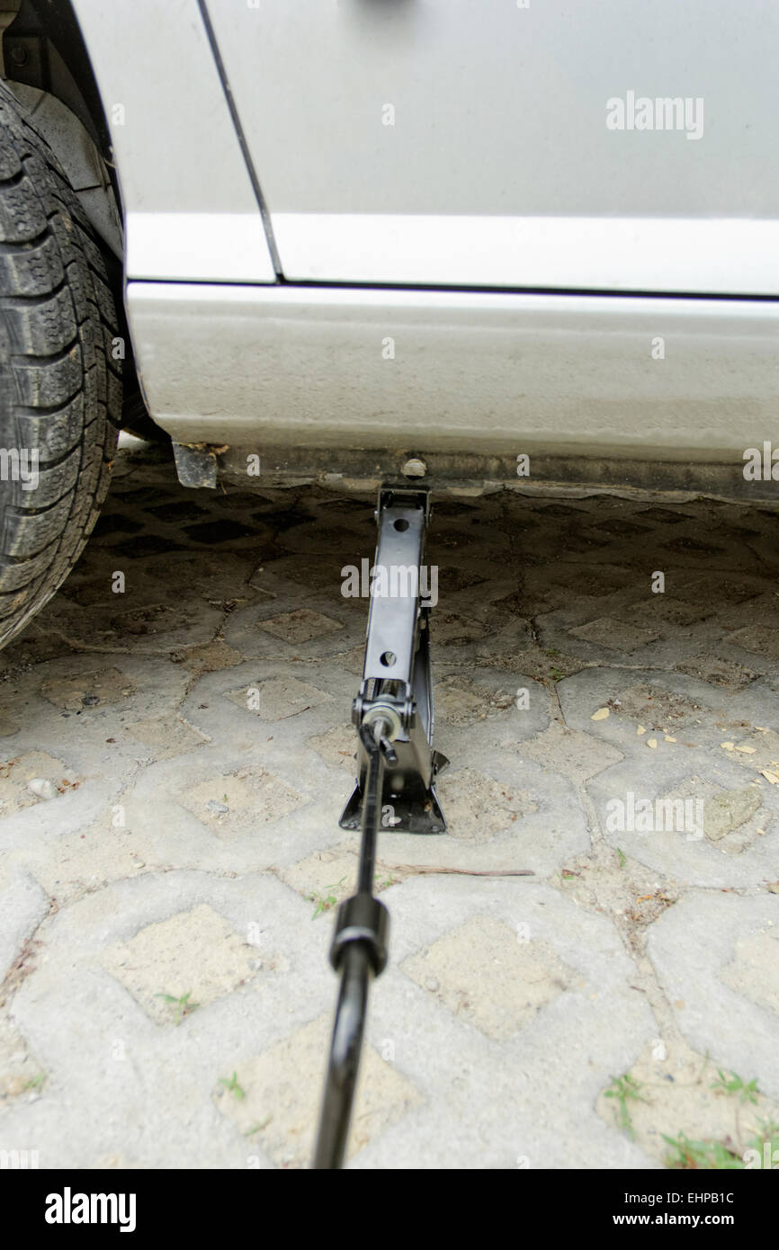 Car lifted up Stock Photo - Alamy