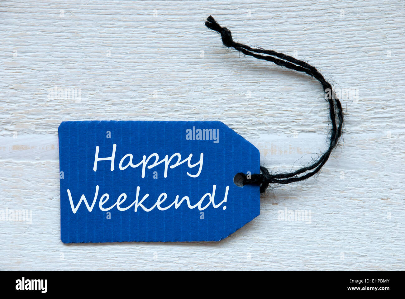 Blue Label Or Tag With Black Ribbon On White Wooden Background With ...