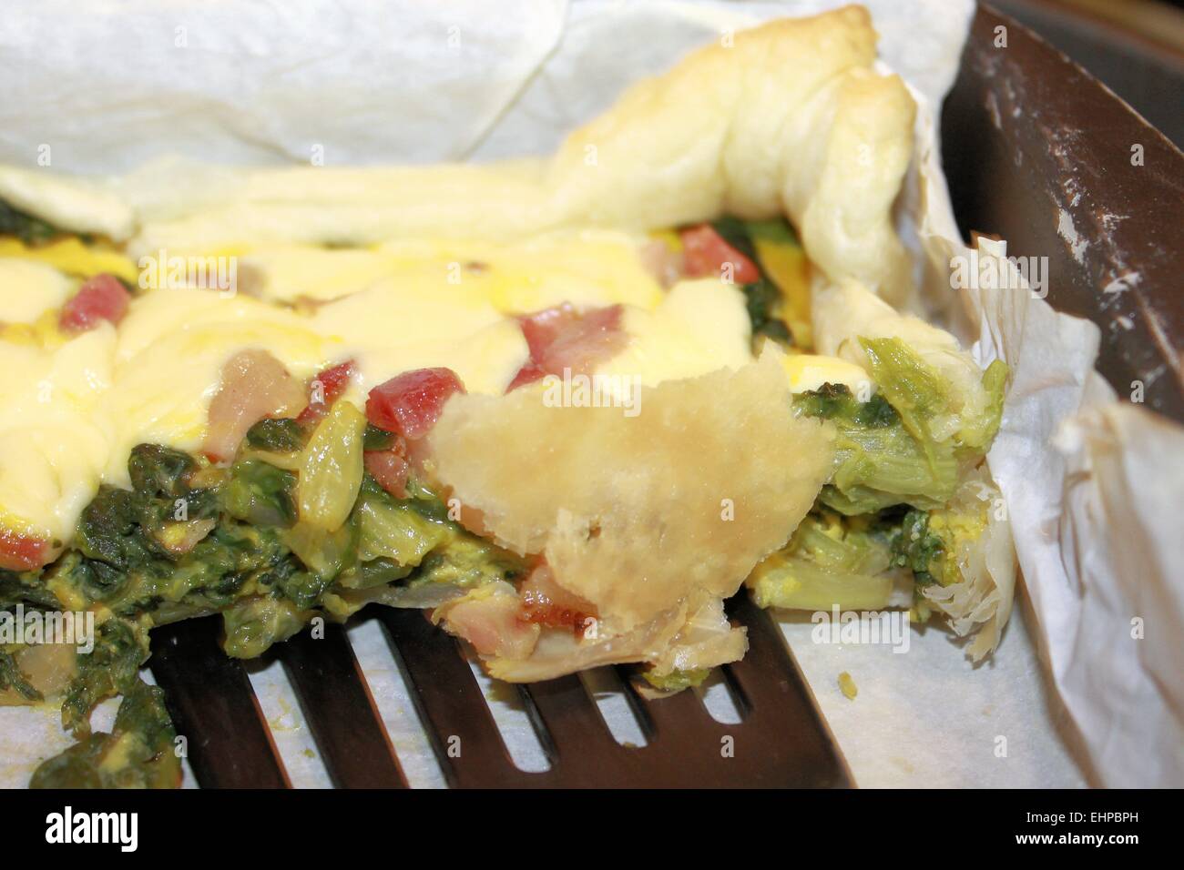 Italian savory pie with bacon, fontina cheese, eggs and herbs Stock ...
