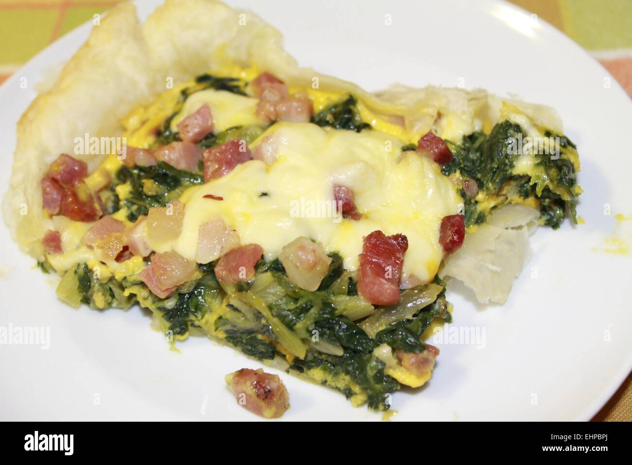 Italian savory pie with bacon, fontina cheese, eggs and herbs Stock ...