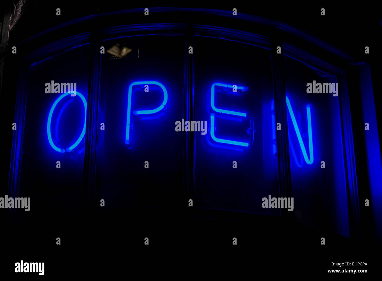 Blue neon OPEN sign Stock Photo - Alamy