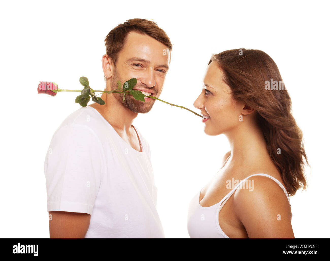 Husband offering a rose to his happy wife Stock Photo - Alamy