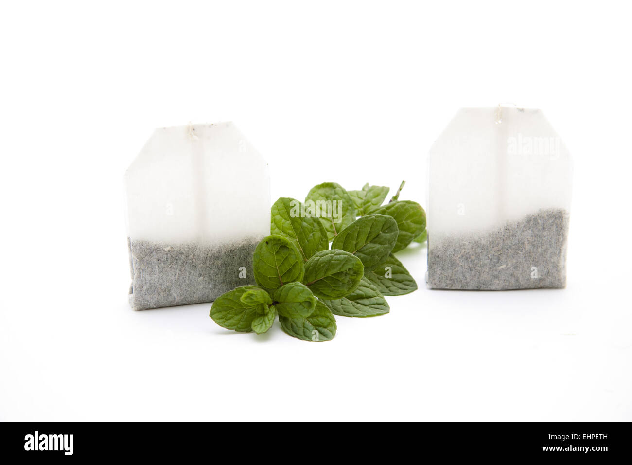 Peppermint tea green leaves Cut Out Stock Images & Pictures - Alamy