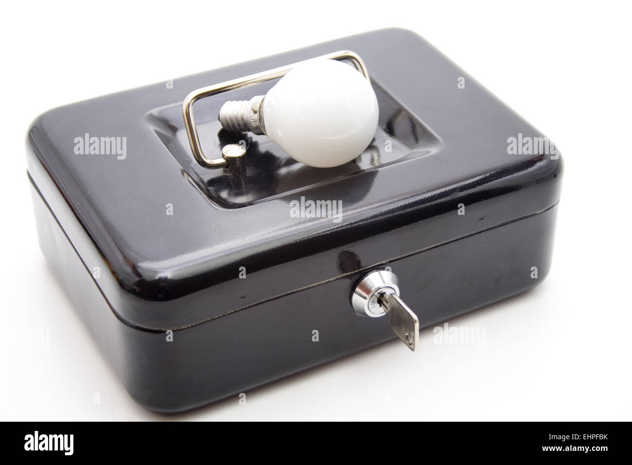 Cashbox and light bulb Stock Photo - Alamy