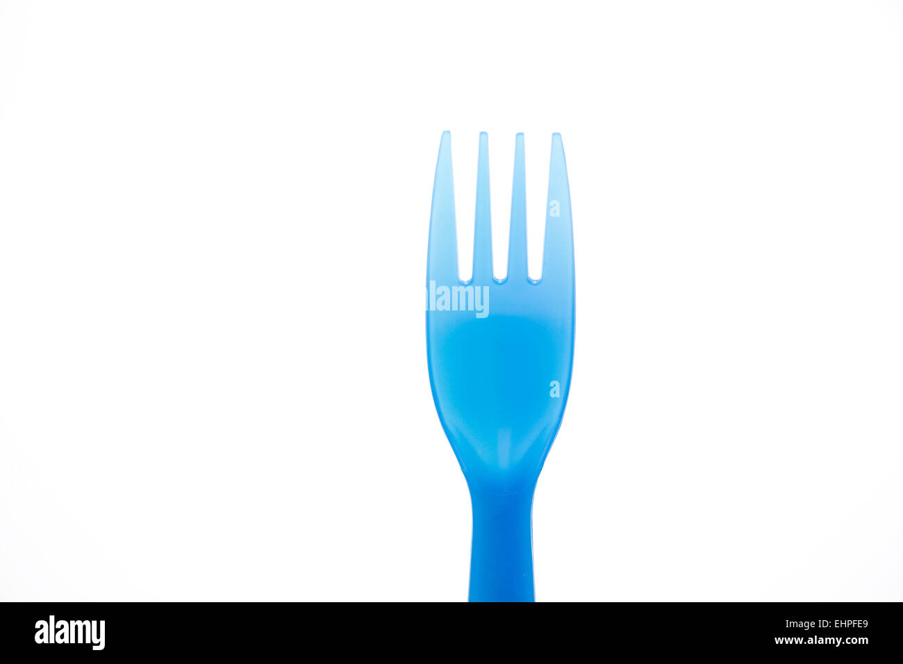 Blue plastic fork Stock Photo - Alamy