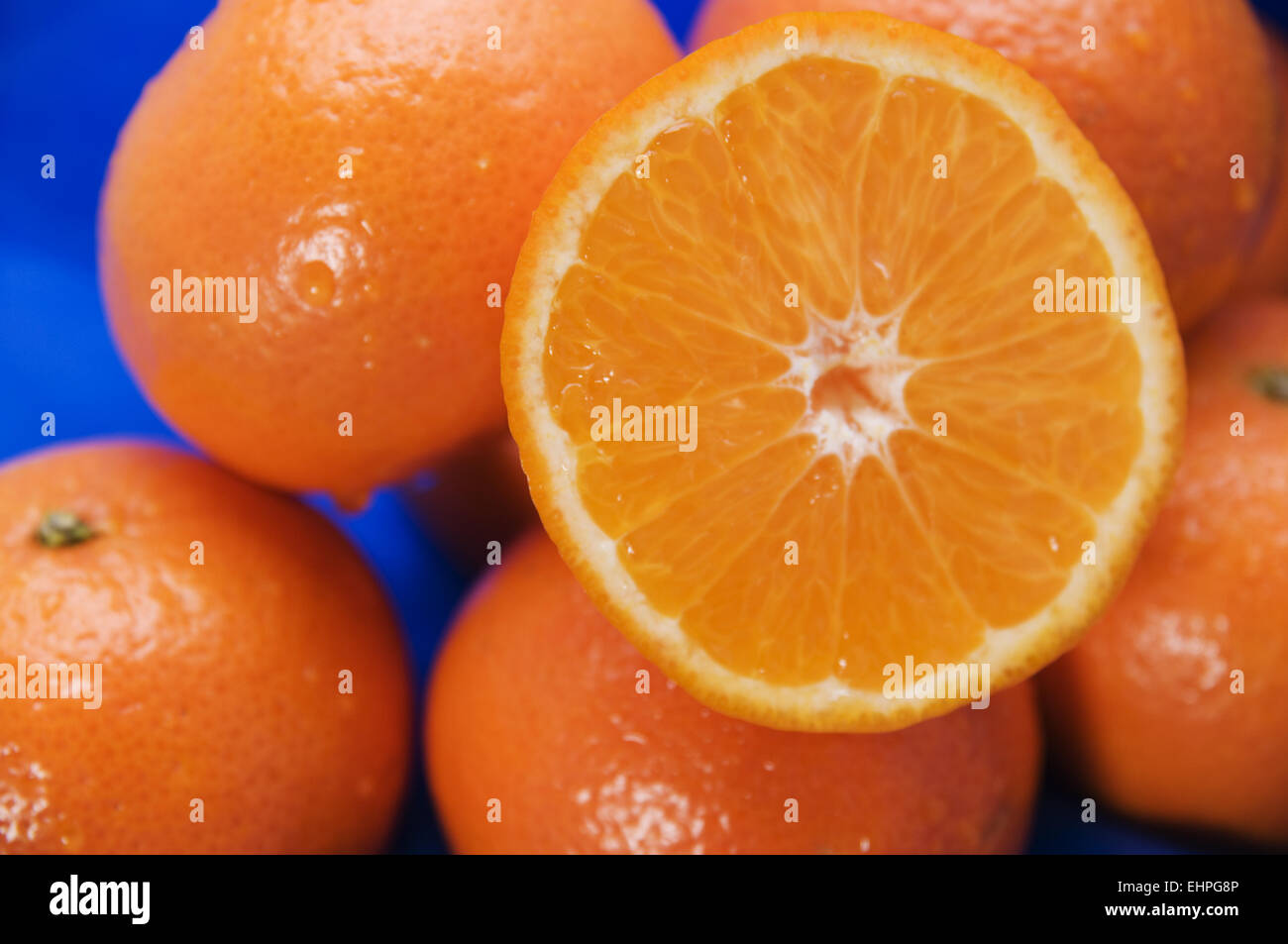 Halved orange hi-res stock photography and images - Alamy