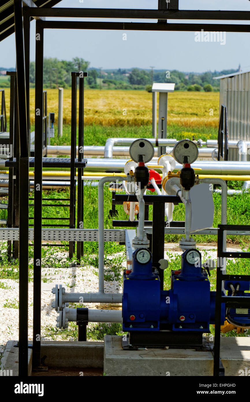 industrial pipes at an oil well Stock Photo - Alamy