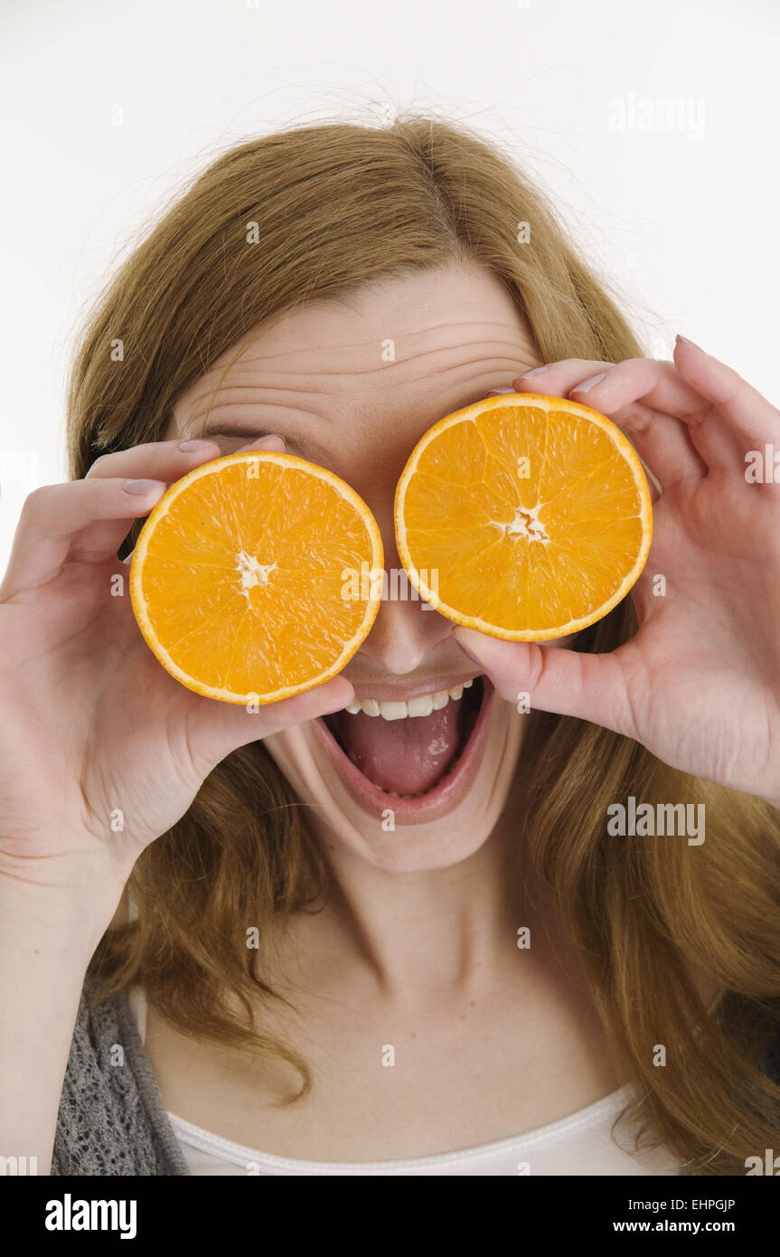 oranges and mouth open vertical Stock Photo - Alamy