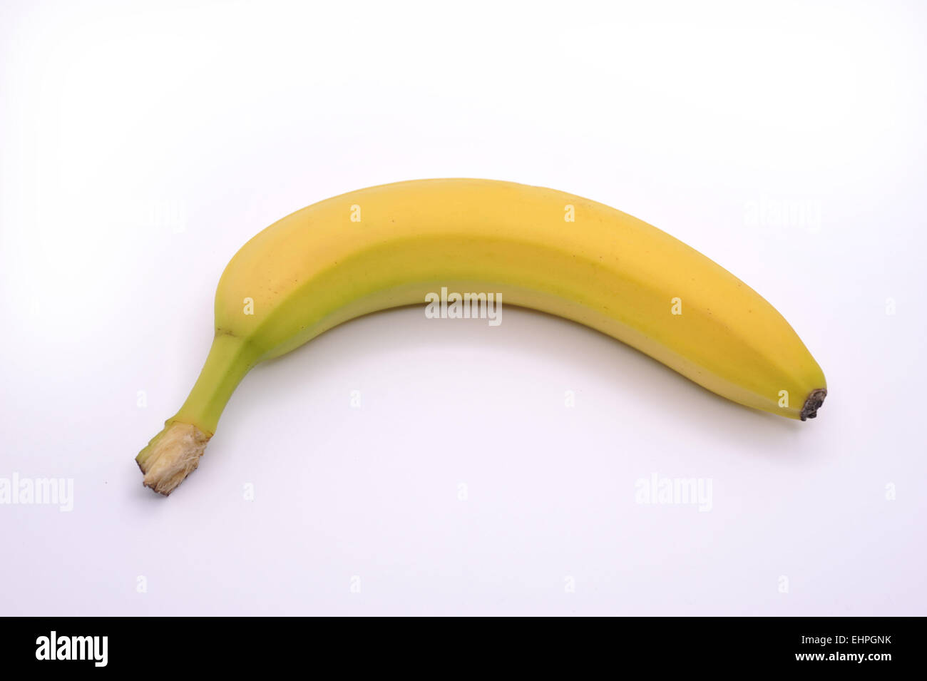 single banana over white Stock Photo - Alamy