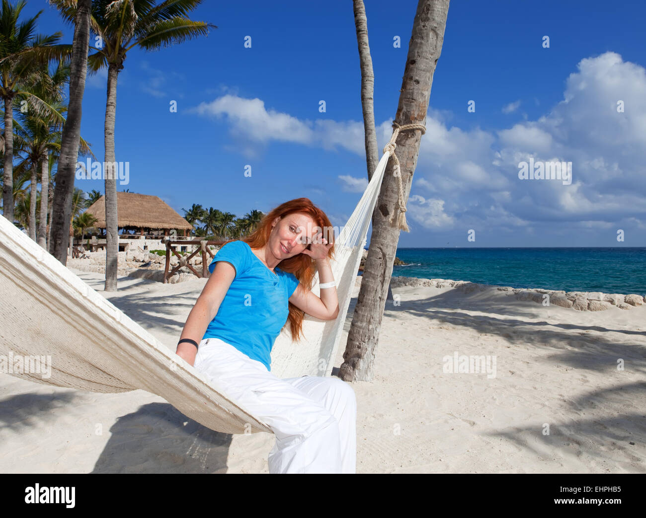 Woman in hammock on tropical hi-res stock photography and images - Alamy
