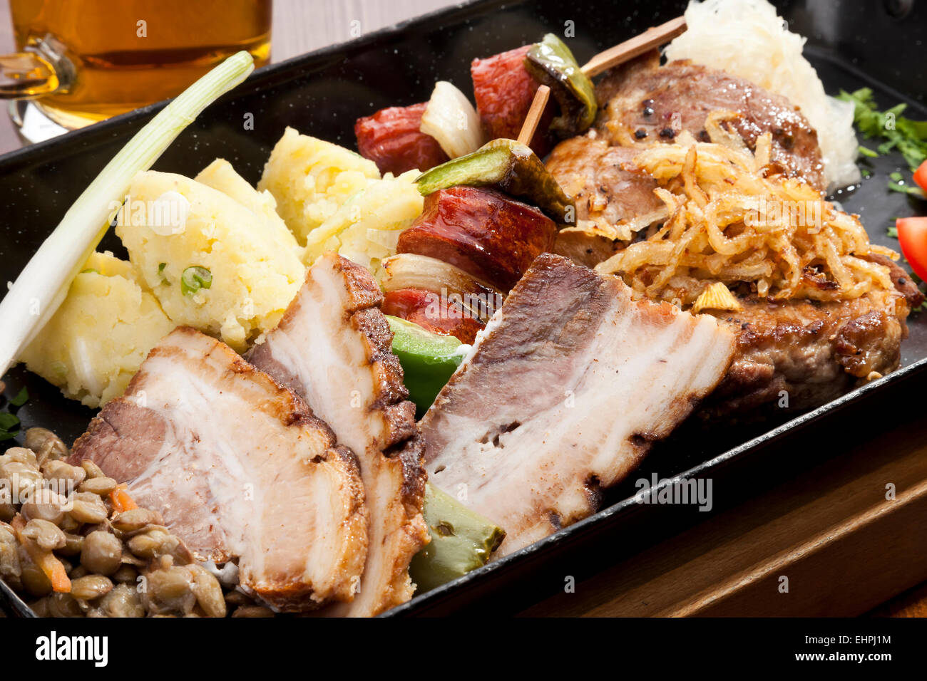 Various kind of grilled meat and sausages in european style Stock Photo ...