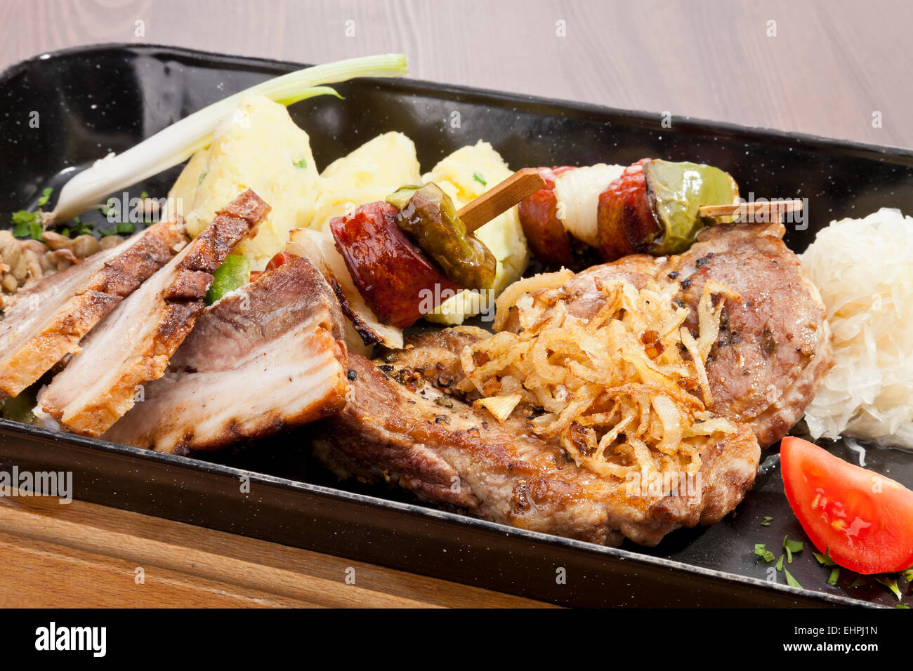 Various kind of grilled meat and sausages in european style Stock Photo ...