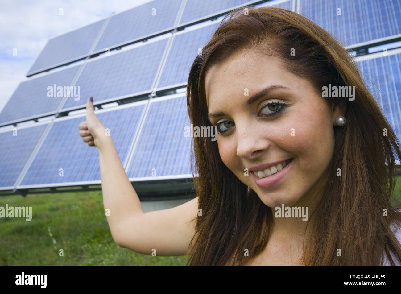 woman show photovoltaics Stock Photo - Alamy