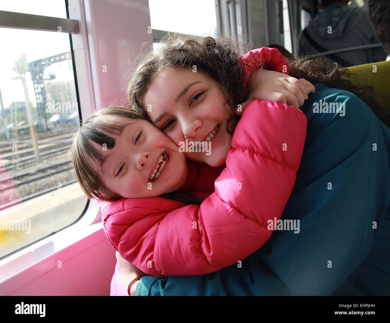 Portrait of girls in the train Stock Photo - Alamy