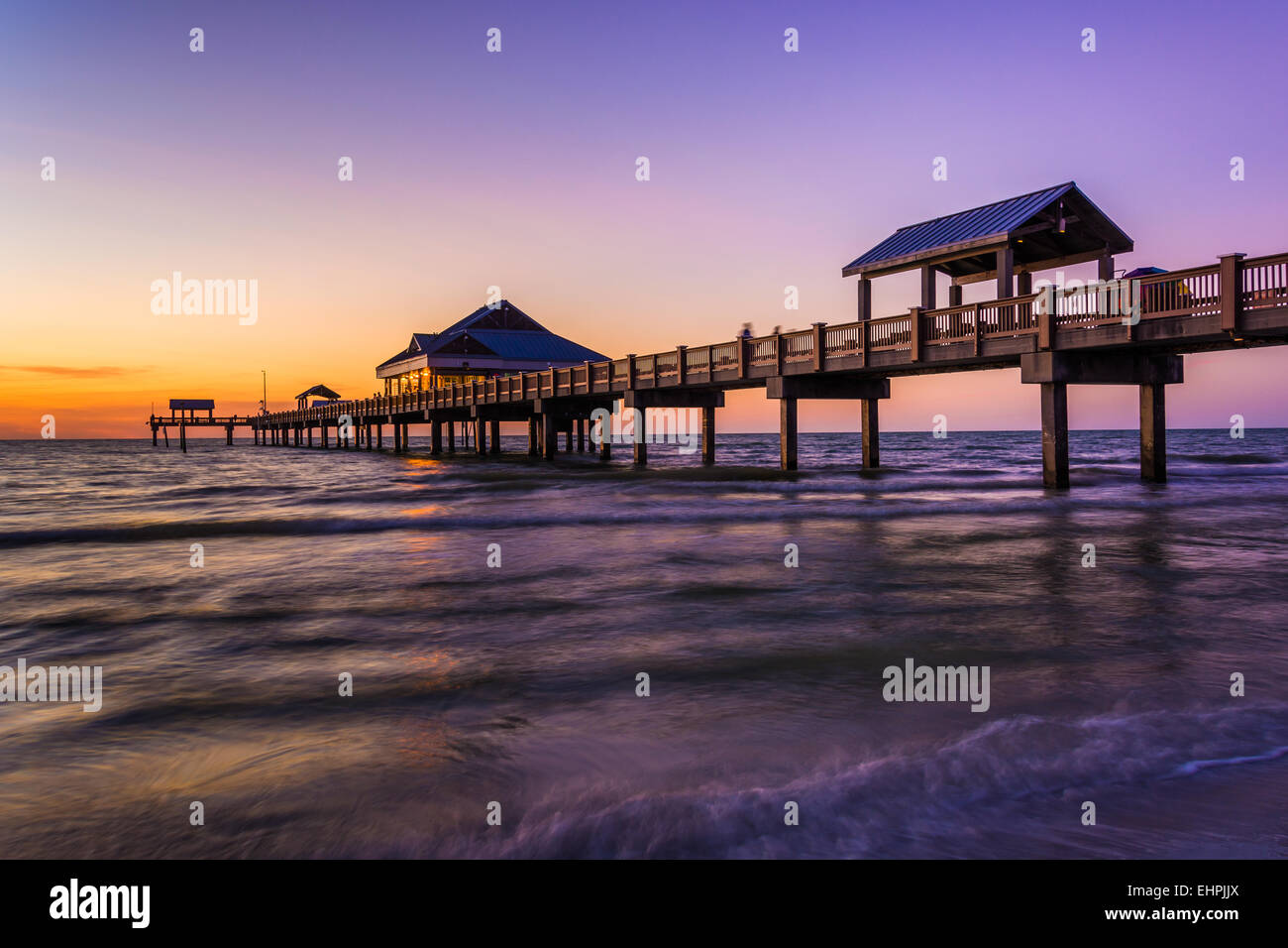 Fishing pier in the Gulf of Mexico at sunset, Clearwater Beach, Florida ...