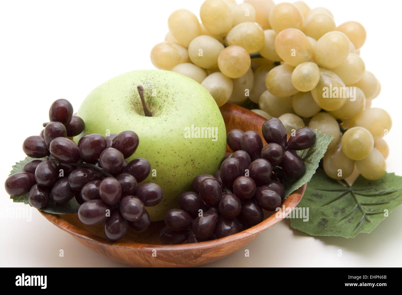 Green apple with grapes Stock Photo - Alamy