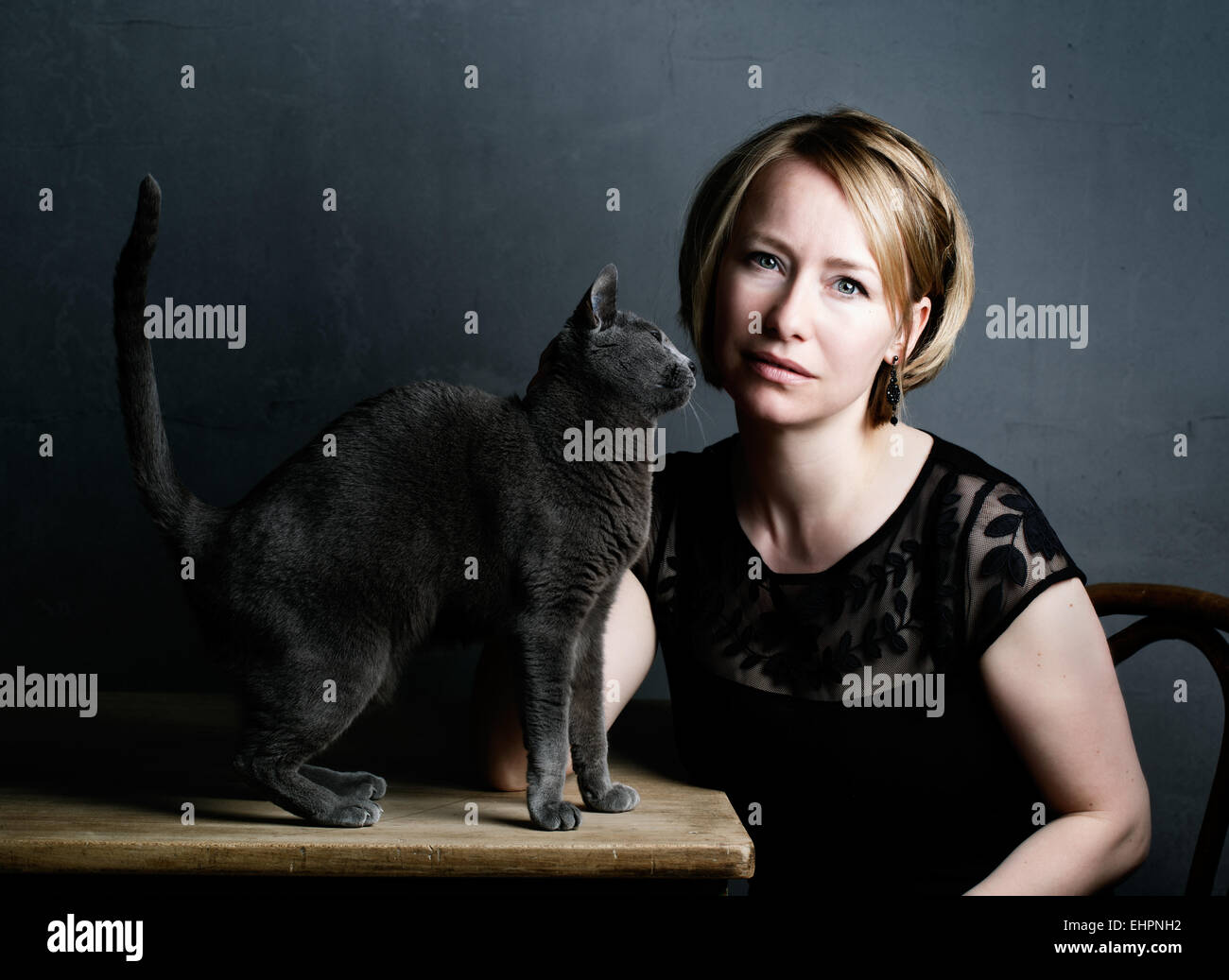 Woman and Cat Stock Photo - Alamy