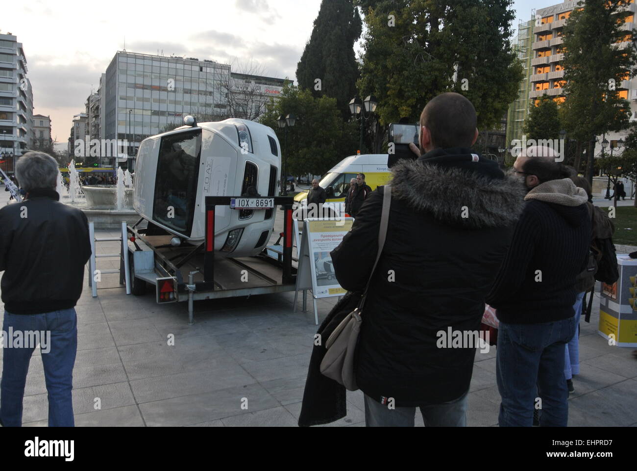 A special car rig is used to show what happens when a car is toppled ...