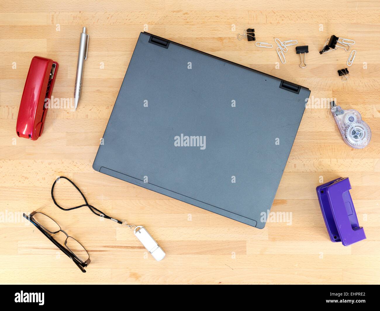 Stationery and work objects on a wooden office desk Stock Photo - Alamy