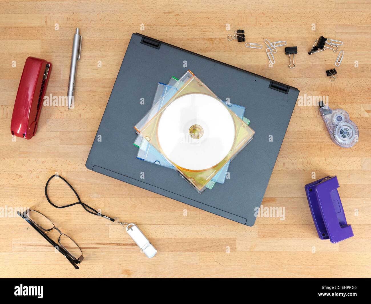 Stationery and work objects on a wooden office desk Stock Photo - Alamy