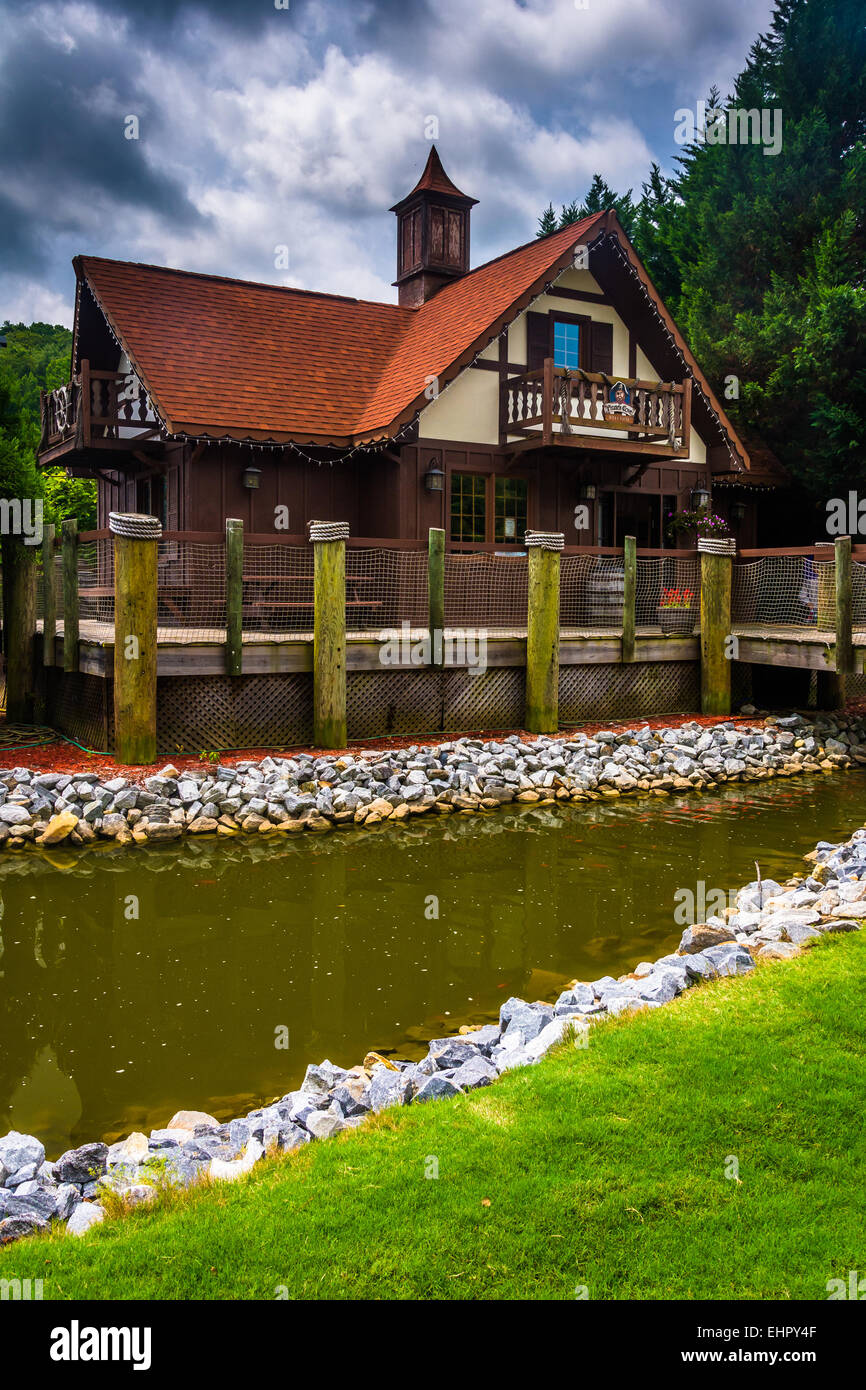 Small stream and red-roofed building in Helen, Georgia Stock Photo - Alamy