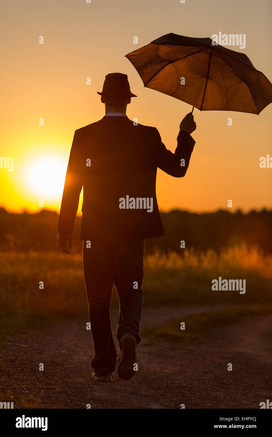 Umbrella walks hi-res stock photography and images - Alamy