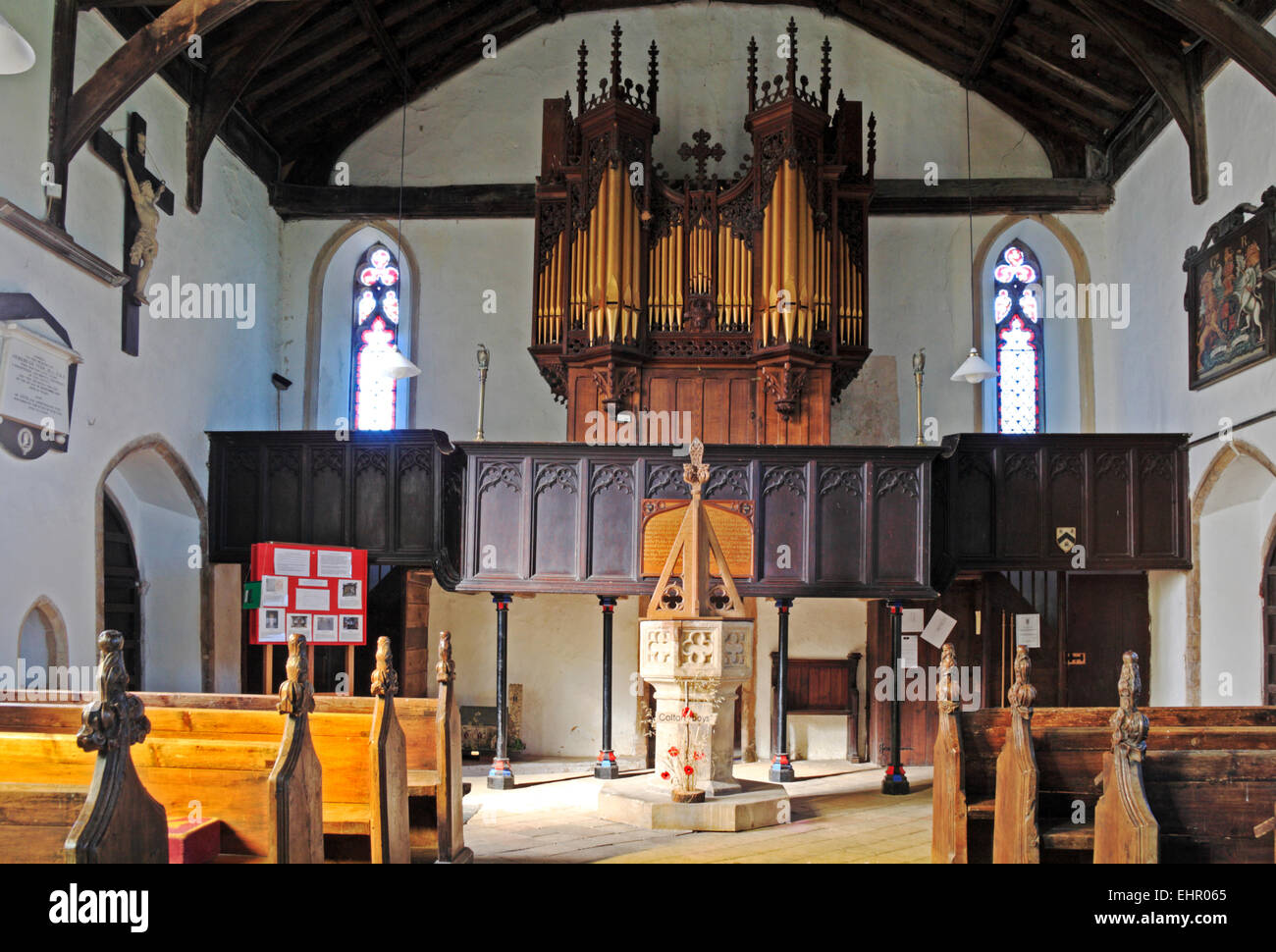 Font and organ loft in the interior of the church of St Andrew at ...