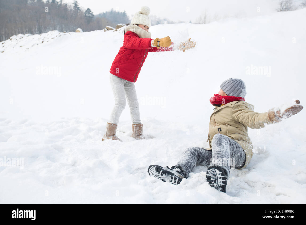 Snowball fight children hi-res stock photography and images - Alamy