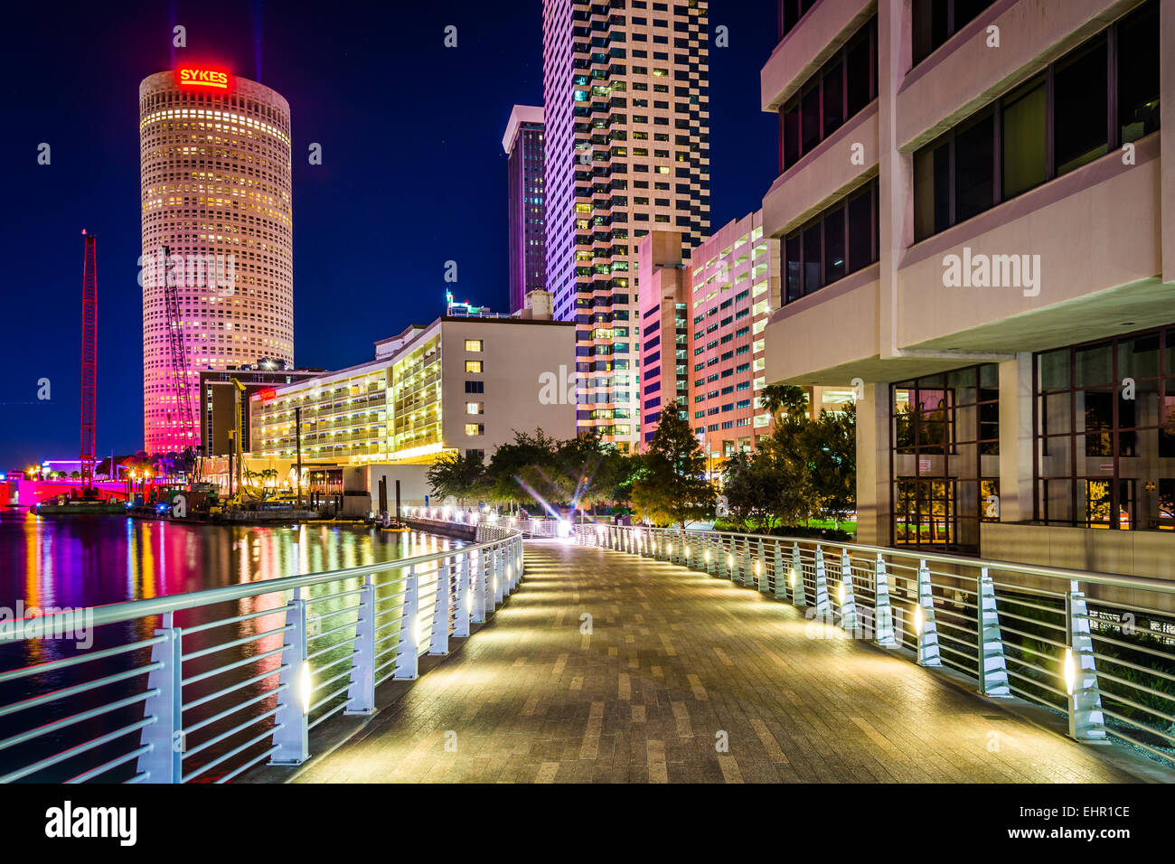 The Riverwalk and skyscrapers at night in Tampa, Florida Stock Photo ...