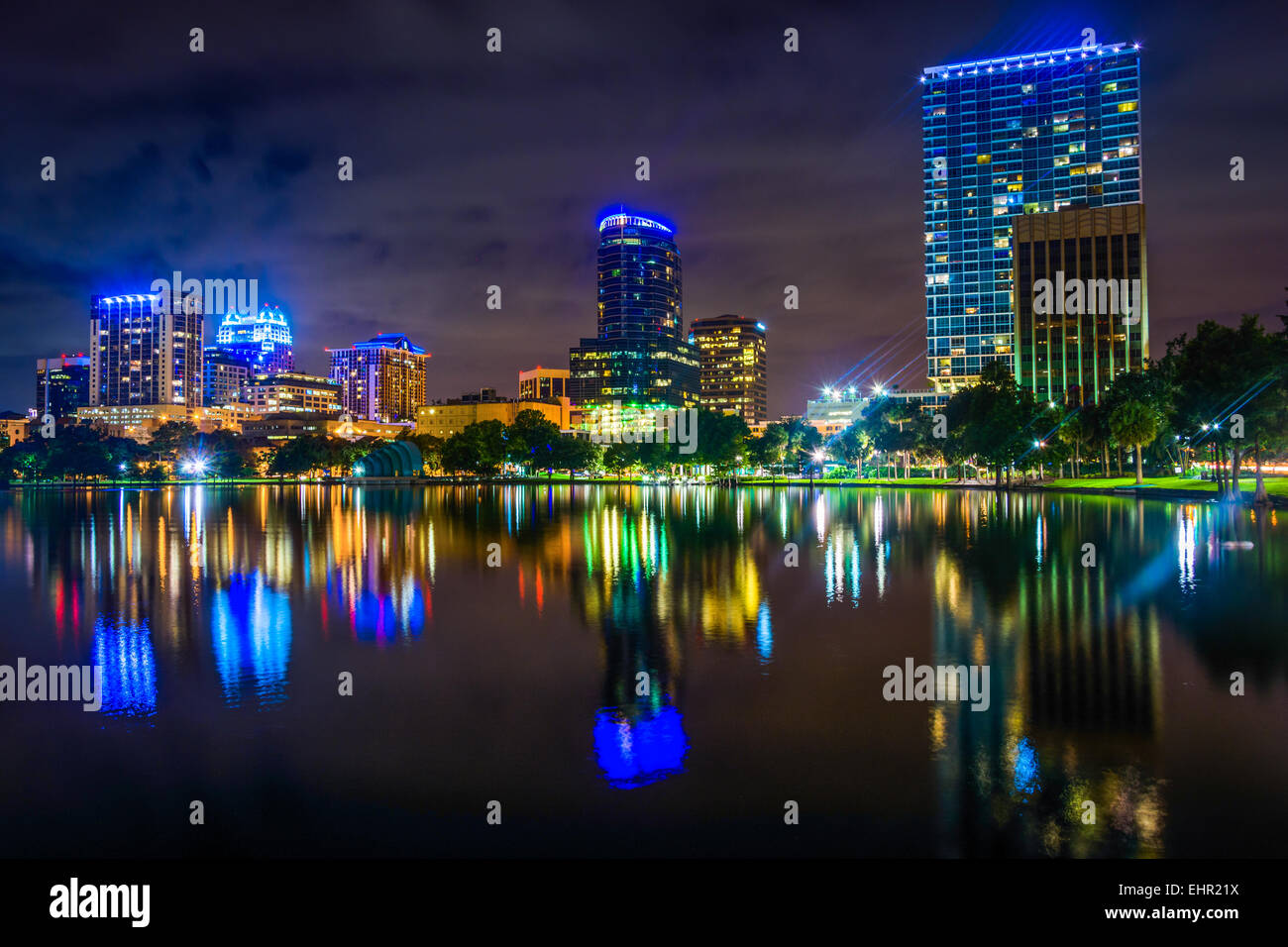 The skyline reflecting in Lake Eola at night, Orlando, Florida Stock ...