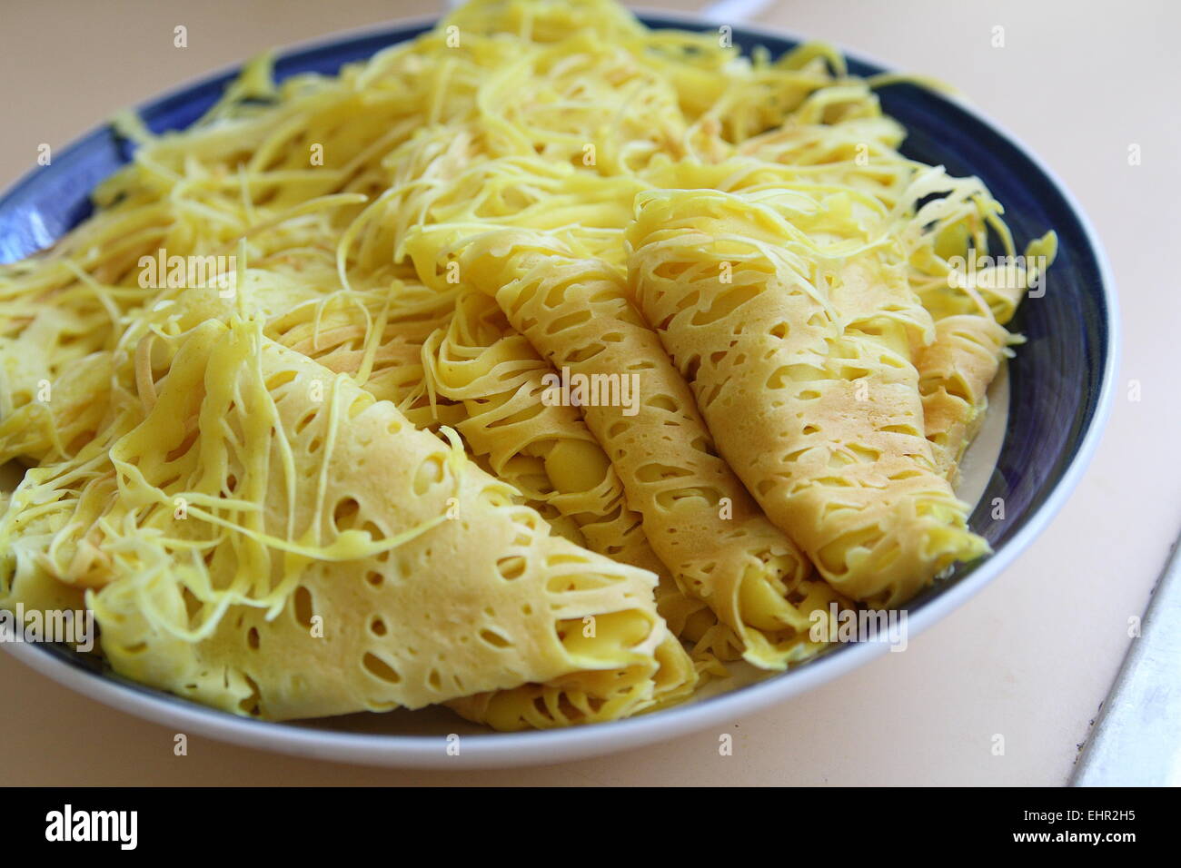 Roti Jala or known as Lace Pancake, one of traditional food from ...