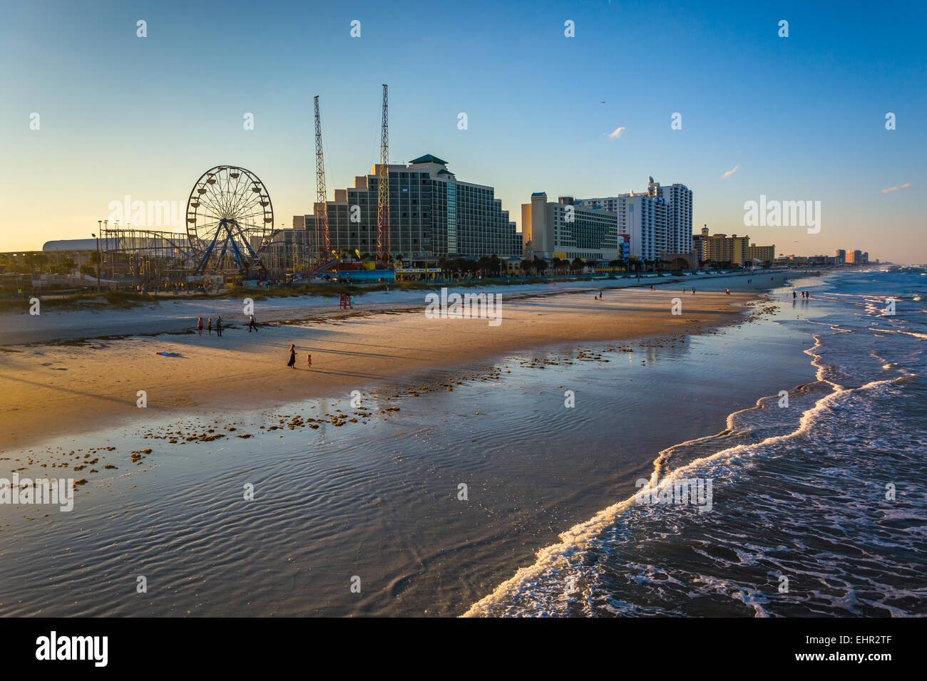 View of hotels and rides along the boardwalk from the fishing pier in ...