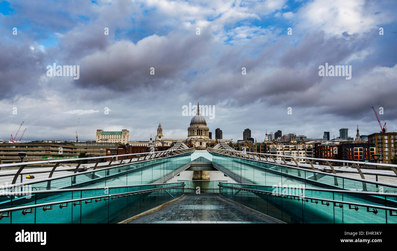 The Millennium Footbridge crosses the river Thames connecting the south ...