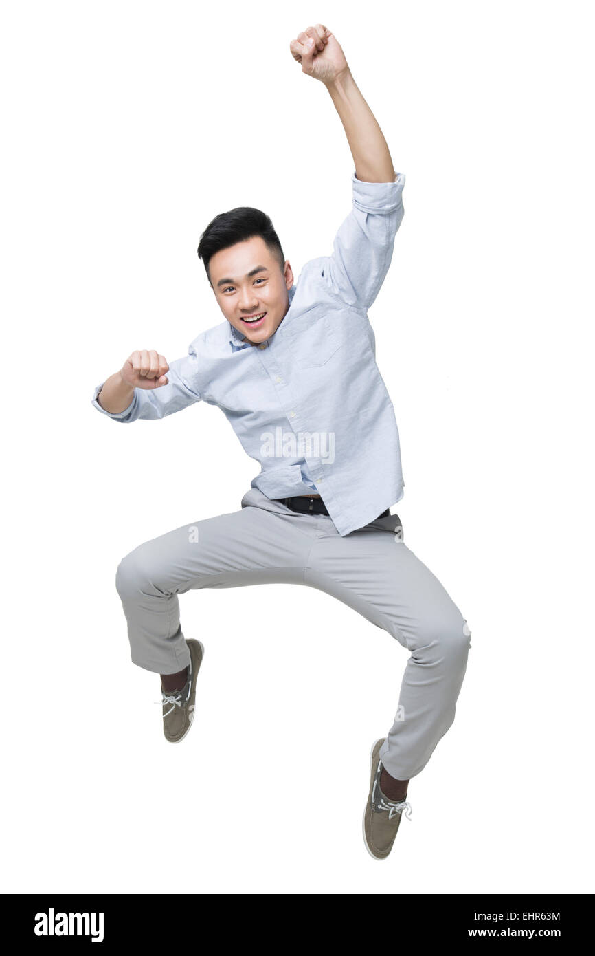Man jumping and punching in air hi-res stock photography and images - Alamy