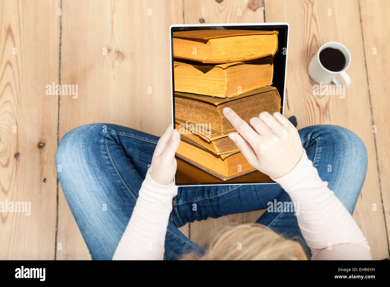 tablet with photo of books Stock Photo - Alamy
