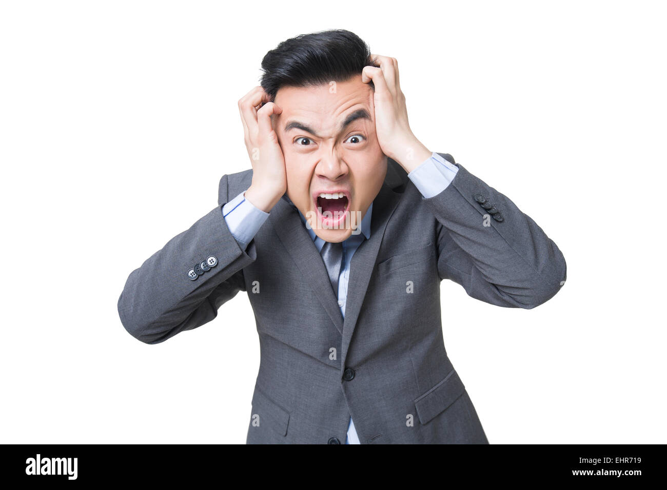 Young businessman screaming Stock Photo - Alamy