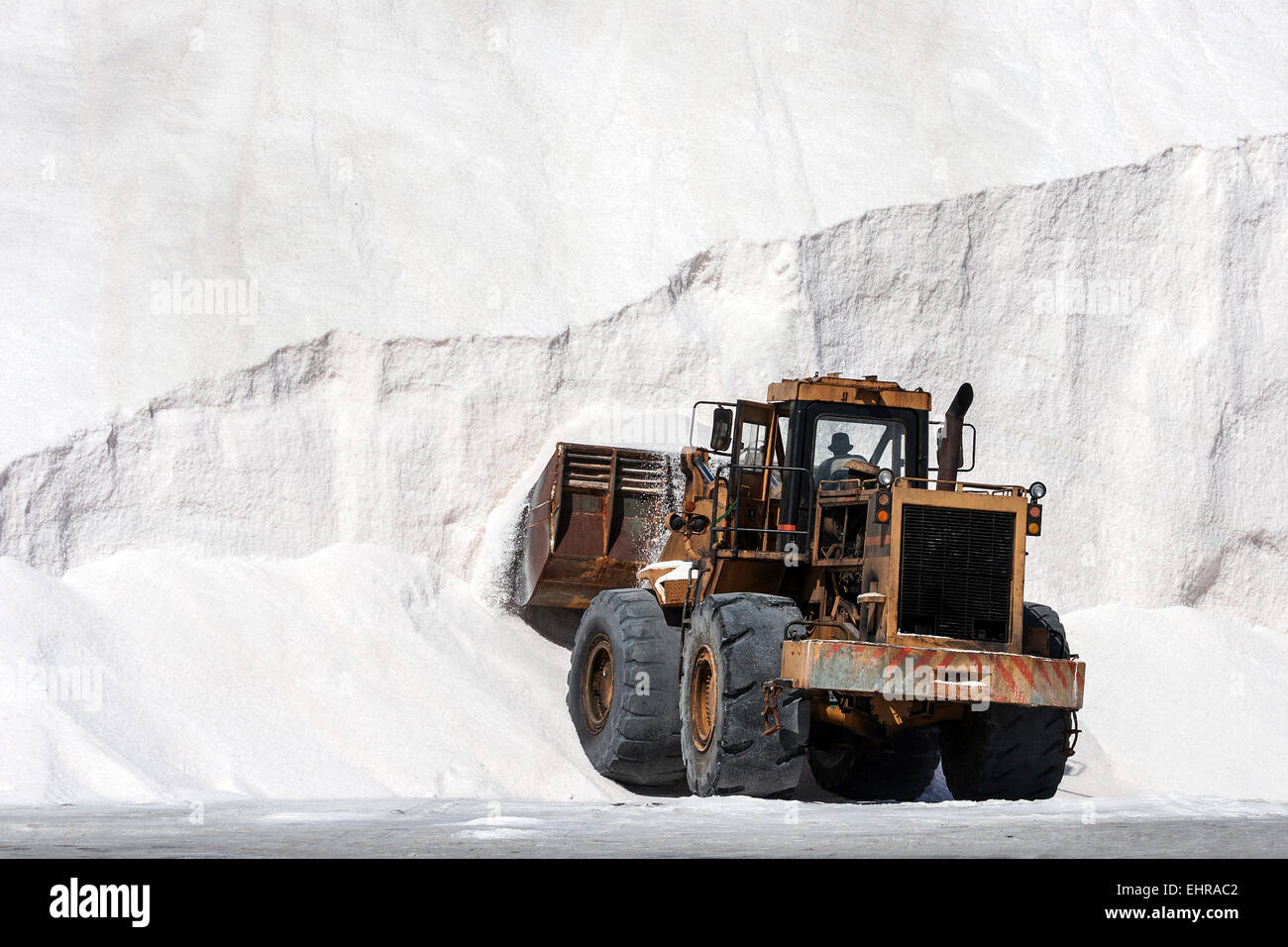Wheel loader, sea salt production at Walvis Bay, Namibia Stock Photo ...