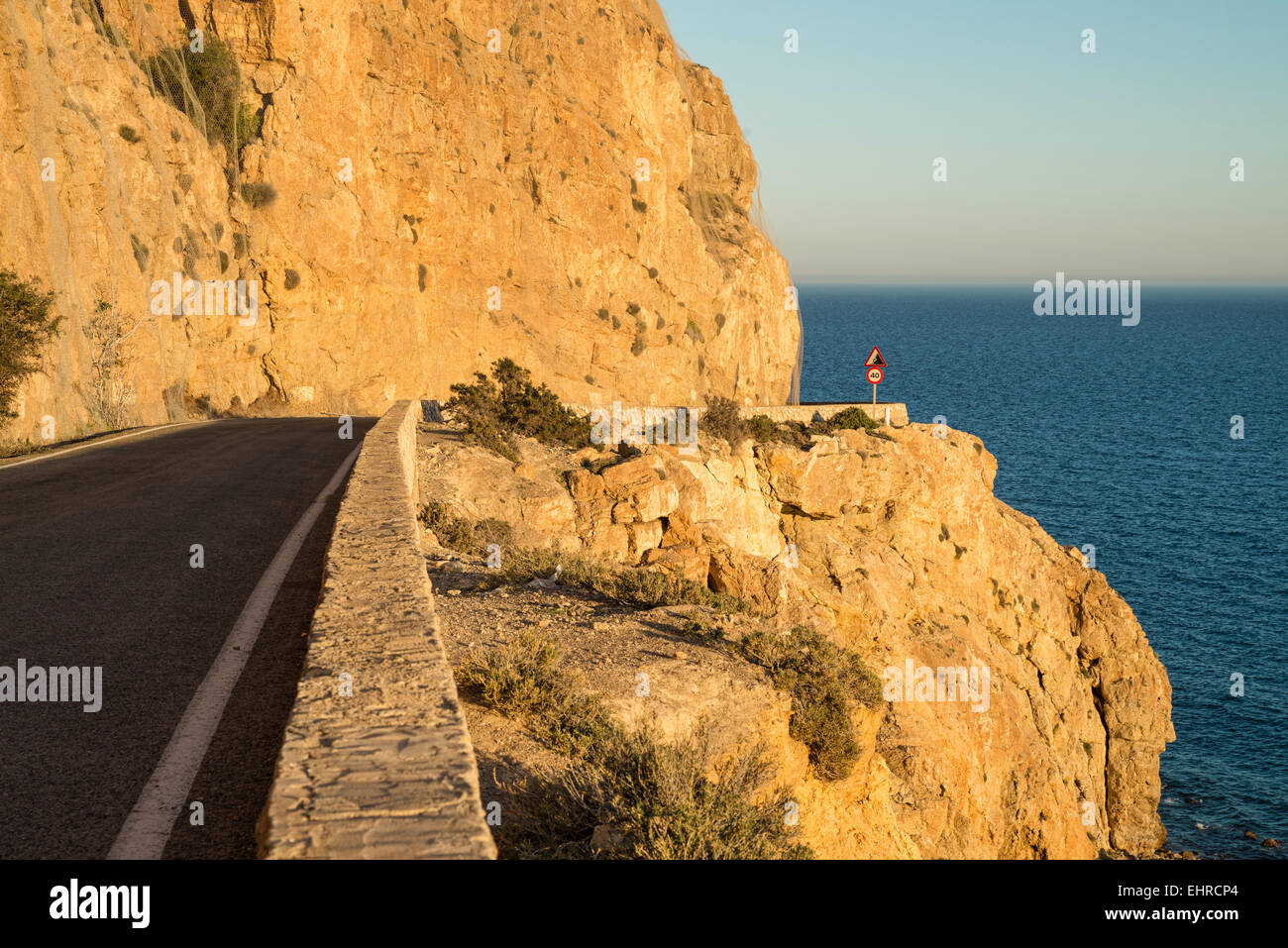 Scenic coastal road running along a rocky coastline Stock Photo - Alamy