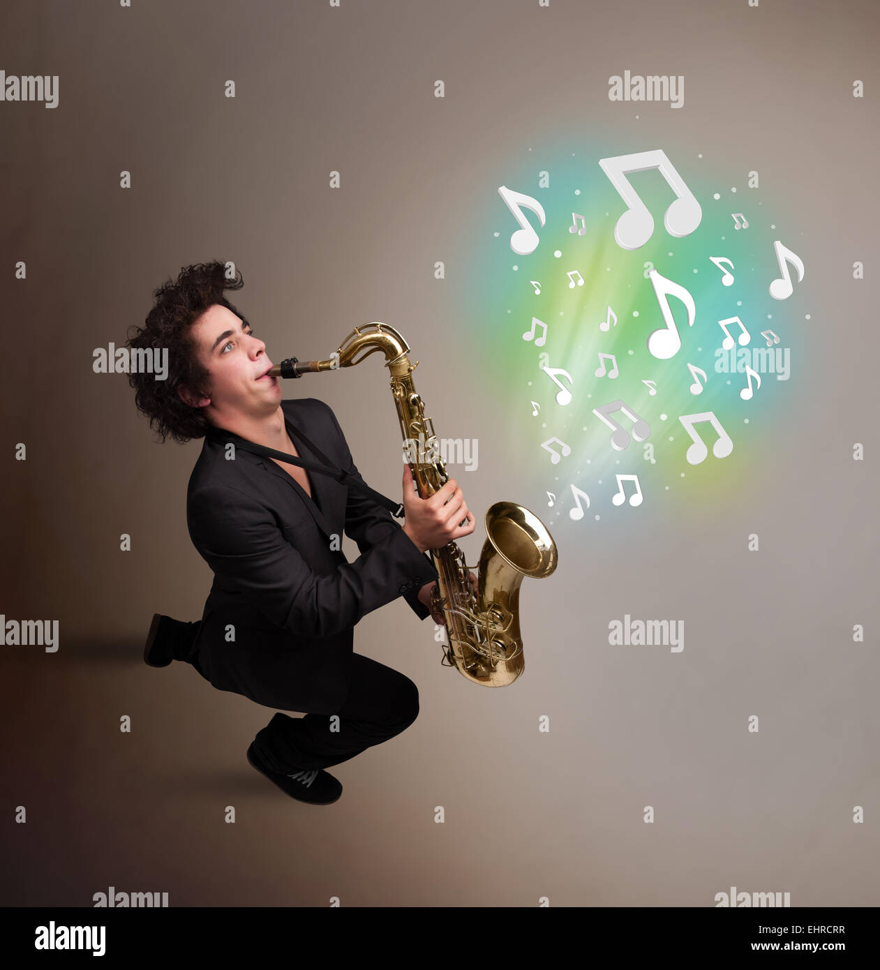 Young musician playing on saxophone while musical notes exploding Stock ...
