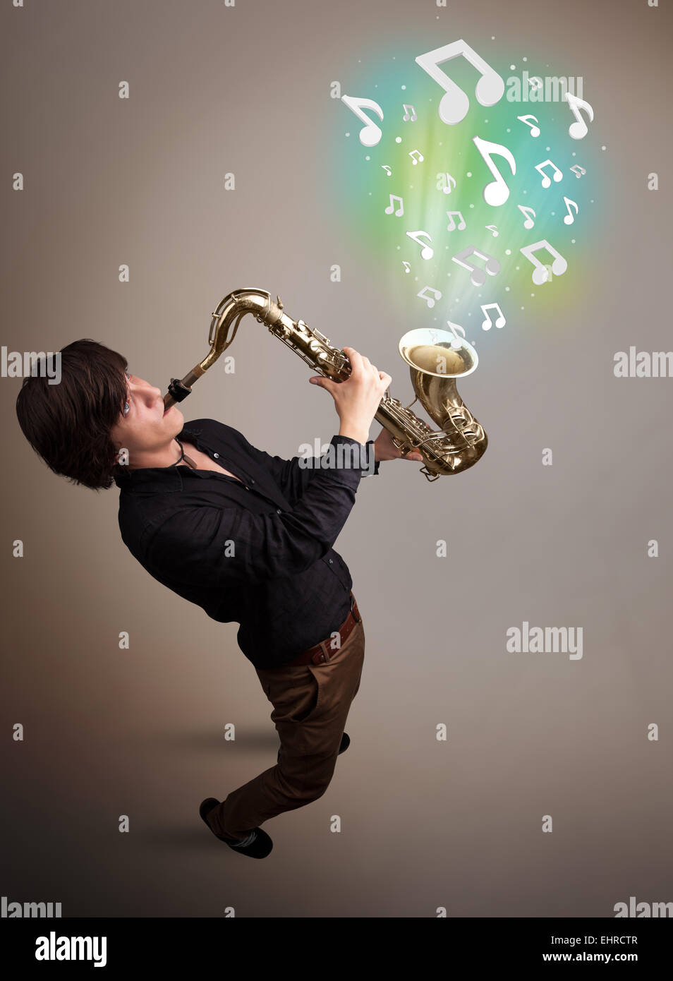 Young musician playing on saxophone while musical notes exploding Stock ...