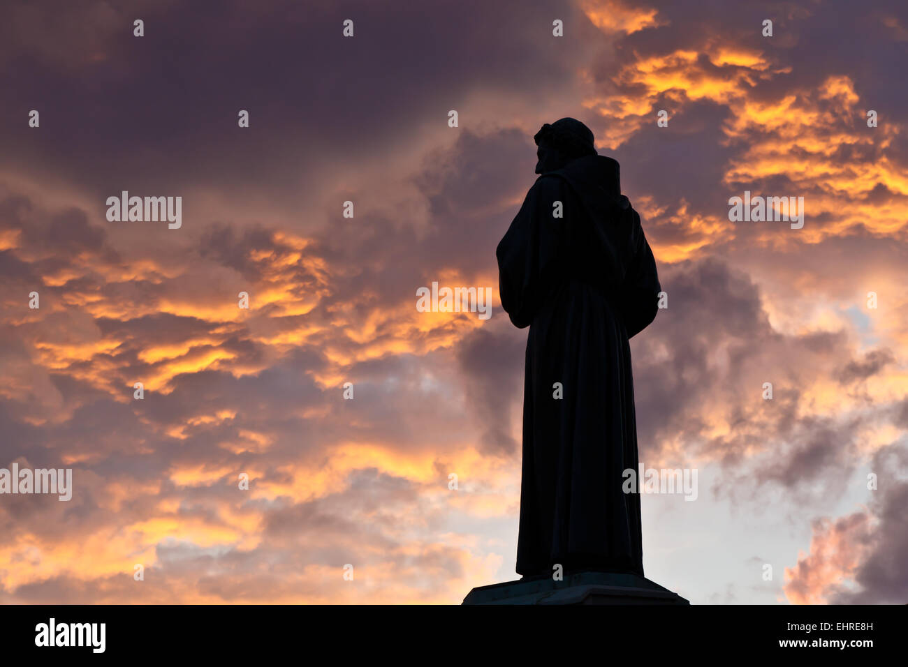 Monk Silhuete and Dusky Cloudy Sky Stock Photo - Alamy