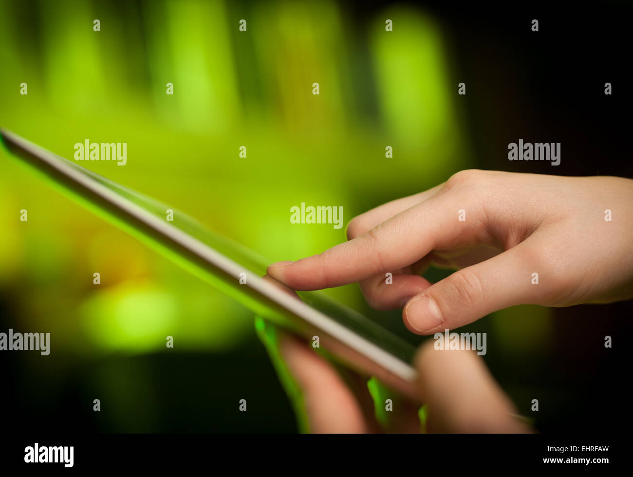 Finger pointing on tablet pc with empty space Stock Photo - Alamy