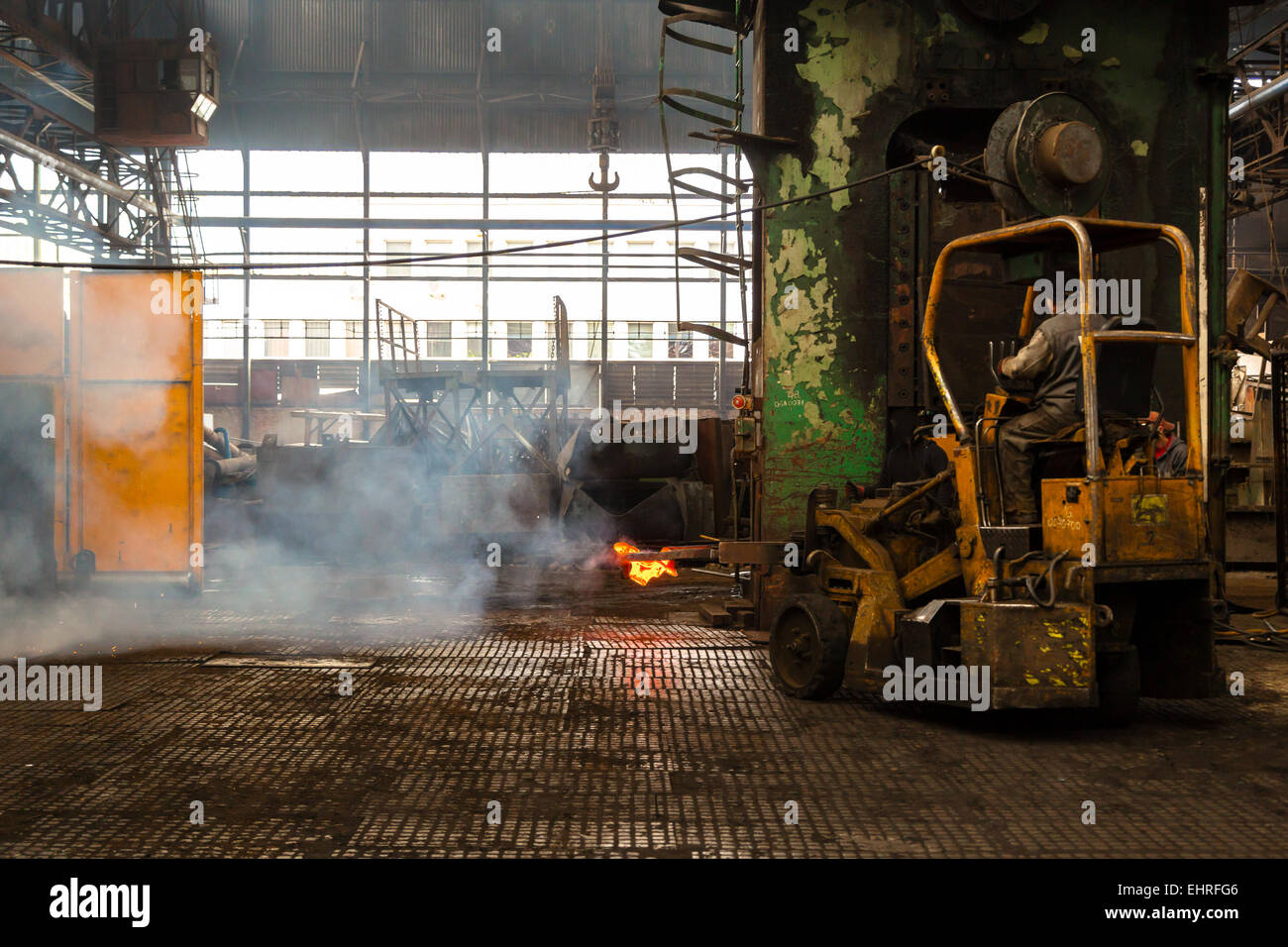 Hard work in a factory Stock Photo - Alamy
