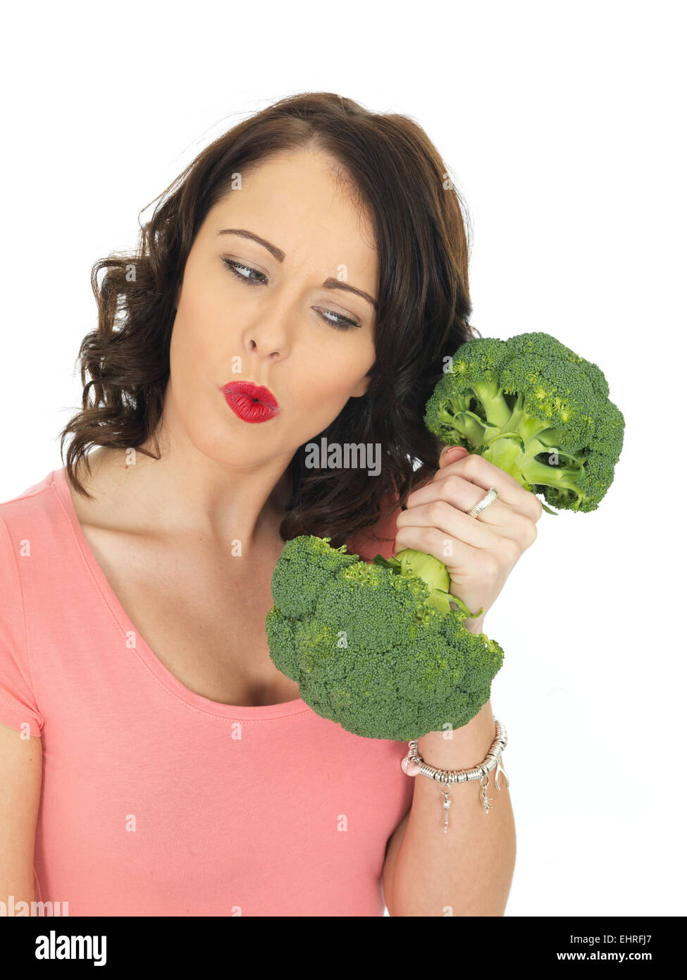 Young Attractive Woman Holding Raw Broccoli Stock Photo - Alamy