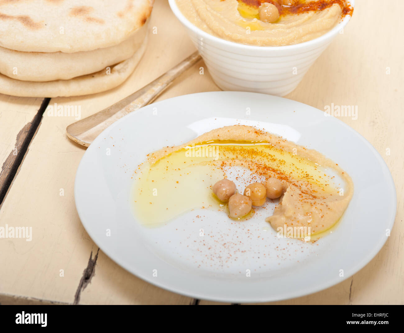 traditional chickpeas Hummus with pita bread and paprika on top Stock ...